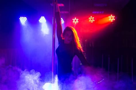 Premium Photo Pole Dance Slender Sexy Woman Dancing In The Interior