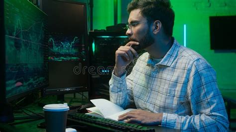 Indian Arabian Man Looking Monitor Computer Chart Graph Trading Online