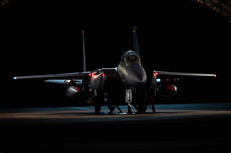 An F 22 Raptor Fighter Jet Flying Through The Air Wallpaper Wallpapersok