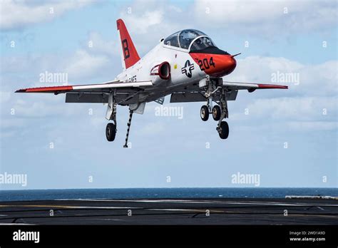 A T 45c Goshawk Makes An Arrested Landing Aboard Uss Dwight D