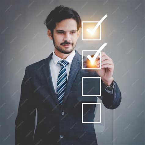 Businessman Use Pen To Tick Correct Sign Mark In Checkbox For Quality