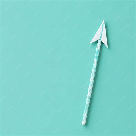 A Small Arrow Pointing To The Right Of The Arrow Premium Ai Generated
