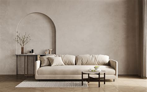 따뜻한 내추럴 컬러의 세련된 거실 브라운 베이지 벽 밝은 라운지 가구 소파 테이블 및 아치 빈 배경 미세 시멘트 모형 룸 사무실 리셉션 3d 렌더링 0명에 대한 스톡 사진