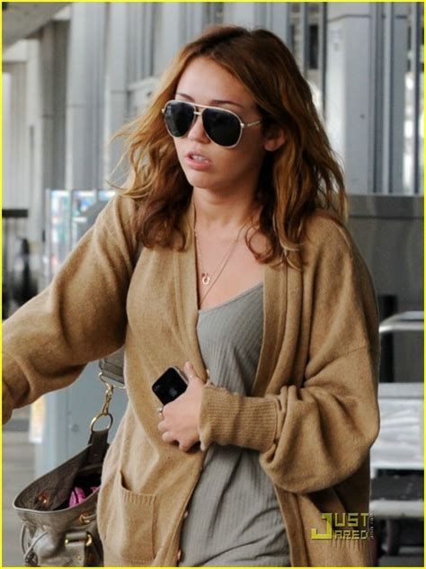 Miley Cyrus And Liam Hemsworth Lax Landing Miley Cyrus Photo 15720853