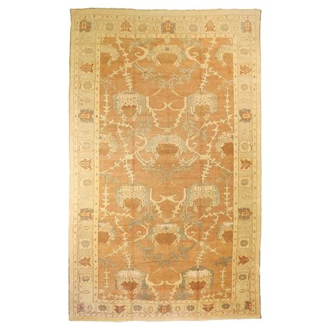 Large Turkish Donegal Rug With Brown And Gray Botanical Details On Ivory Field For Sale At 1stdibs