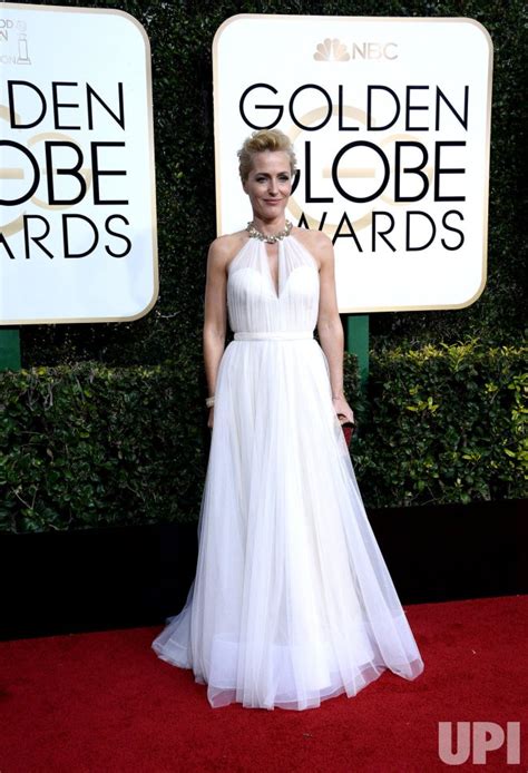 Photo Gillian Anderson Attends The 74th Annual Golden Globe Awards In