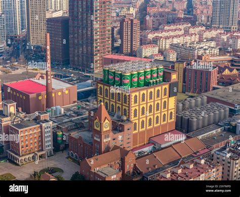 Giant Cans Bearing The Outlooks Of Tsingtao Beer Are Seen Erected On