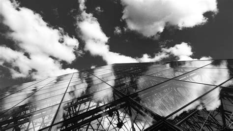 Premium Photo Reflection In A Glass Buliding