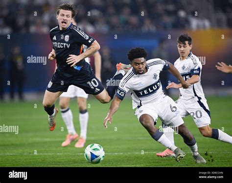 Vancouver Whitecaps Midfielder Ralph Priso 6 Fights For The Ball With