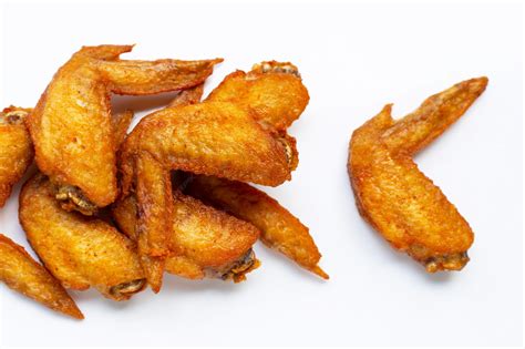 Premium Photo Fried Chicken Wings On White Background
