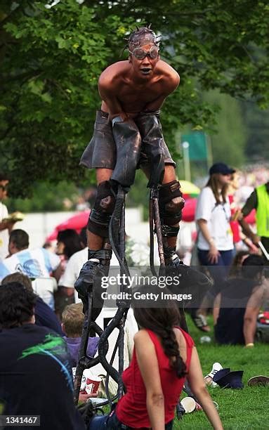 Guy On Stilts Photos And Premium High Res Pictures Getty Images