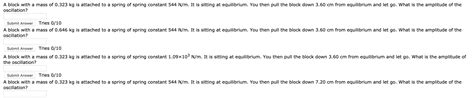 Solved A Block With A Mass Of 0 323 Kg Is Attached To A