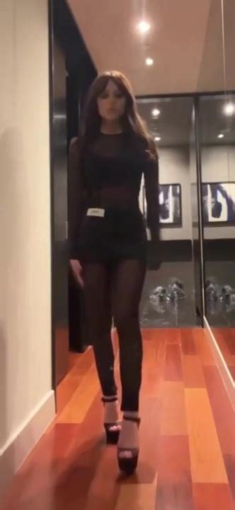 Petite Model Posing In A Provocative Outfit And High Heels In A Solo Feet