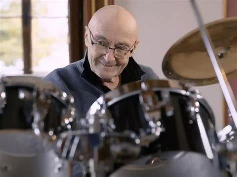 Watch Phil Collins Sit Down At Drum Set For First Time In Years Newsbreak