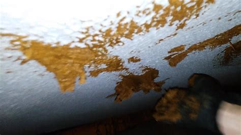 Smearing Shit On A Public Concrete Beam