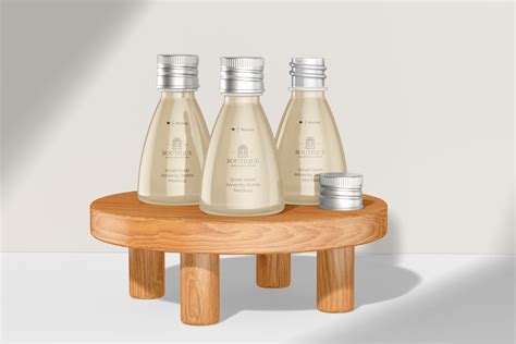Small Hotel Amenity Bottles Psd Mockup On Podium Original Mockups