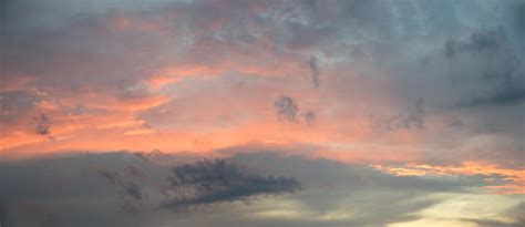 Soft Sky Background With Grey Thunderclouds And Pink Afterglow Stock