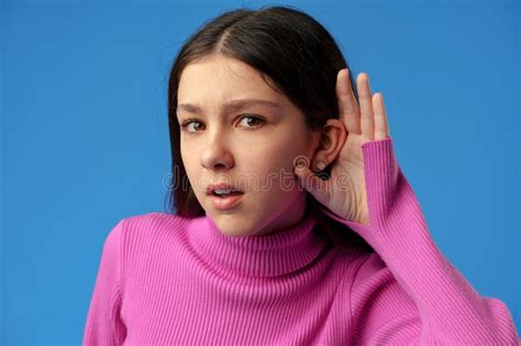 Portrait Of A Smiling Teen Girl Making Selfie Photo On Blue Background Stock Photo Image Of