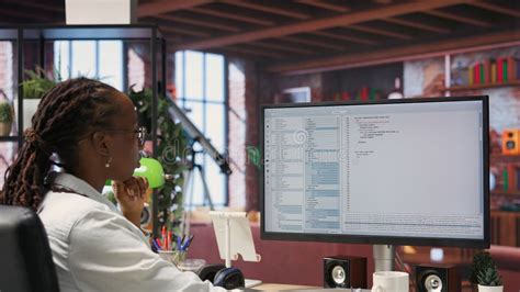 System Administrator Types Code Into Pc Developing Software Stock