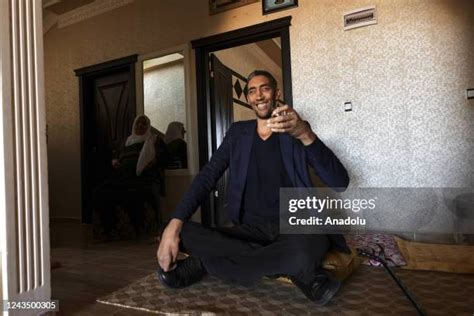 Worlds Tallest Living Man Sultan Kosen Poses For A Photo During The
