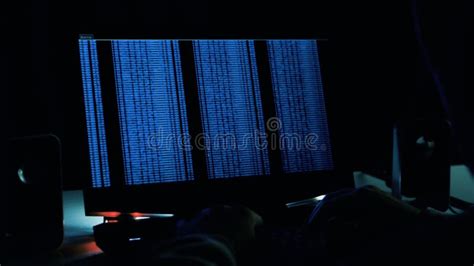 the programmer enters the settings a male hacker is hacking into