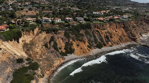 Coastal Bluff Gives Way Behind California Mansions