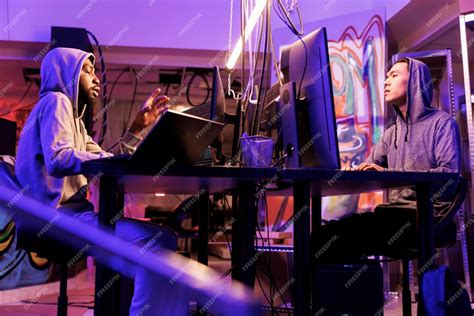 Free Photo Hackers Coding Computer Worm Malicious Software Together And Discussing Server