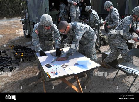 Battery B 258th Field Artillery Soldiers Work At The Fire Direction