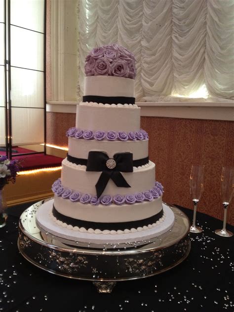Elegant Black And White Wedding Cake With Fondant Ribbon And Sugar Roses