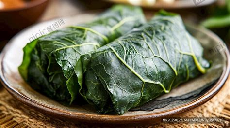 Ai创作图香苏叶包牛肉 烤叶叶粑粑特写 荷叶裹肉 粽叶包肉 烤牛枇杷叶 荷叶牛肉 叶包肉 荷叶包肉 卤水牛伯叶 绿叶包饭 荷叶包饭 荷叶扎肉