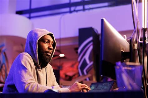 Premium Photo African American Criminal Hacking Online Server And