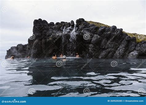 Sky Lagoon In Iceland Tourists Enjoying Geothermal Spa With Heated