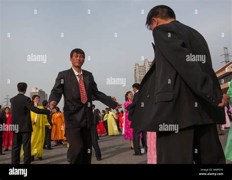 North Korean Young Adults During A Mass Dance Performance In Front Of