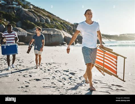 Friends Walking On The Beach