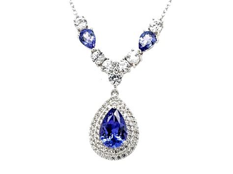 Pear Shape Tanzanite And White Zircon Rhodium Over Sterling Silver