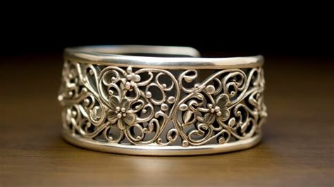 Premium Ai Image A Photo Of Intricate Silver Cuff Bracelet With
