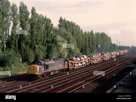 Class 37 Locomotive Approaches York With A Freight Train Including New