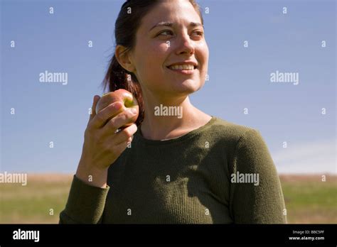 Woman Eating Apple Stock Photo Alamy Woman Eating Apple Stock Photo Alamy