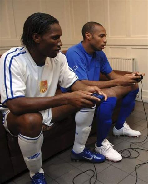 France S Thierry Henry Smiles As Ivory Coast S Didier Drogba Gestures