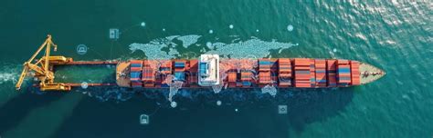 Aerial Top View Container Ship In Pier Crane Bridge Carries Containers