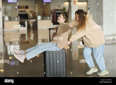 Summer Vacation Concept Portrait Of Cheerful Positive Teen Girl Having Fun And Spreading Hands