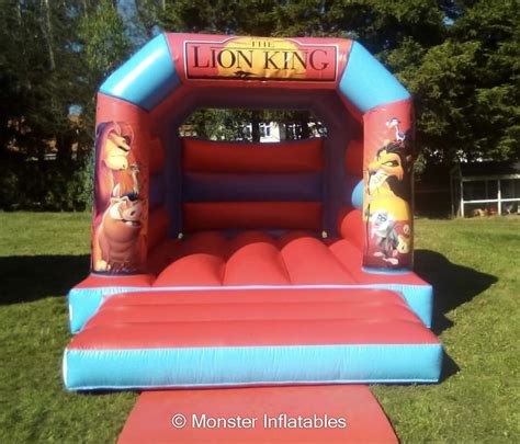Lion King Bouncy Castle Blue 15x12 Bouncy Castle And Soft Play Hire