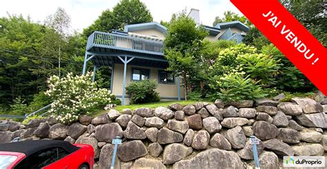 Condo Ste Adele 1600 14462873 Vendu