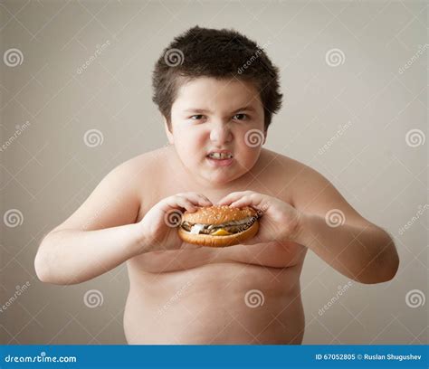 Dieta Gorda De La Hamburguesa Del Niño Del Muchacho Del Niño Que Come