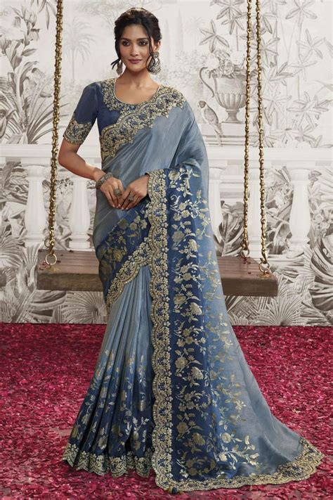 Excellent Fancy Fabric Blue Color Heavy Embroidery Work Saree With Par