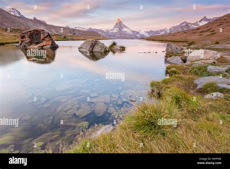 Dawn At Stellisee Lake With The Matterhorn Reflecting Zermatt