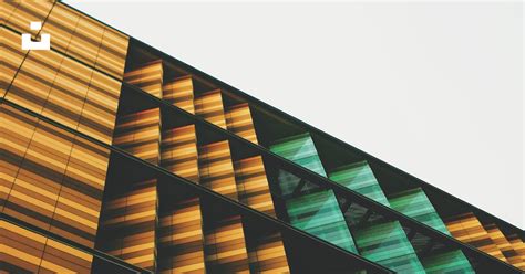 Foto Edificio De Hormigón Marrón Y Azul Imagen Edificio De Oficinas