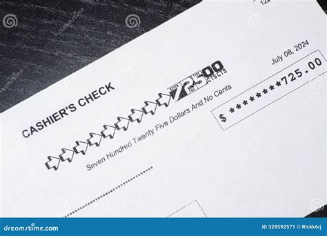 Close Up Of A Bank Cashiers Check Isolated On Black Stock Image Image