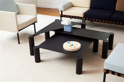 Max Enrich Creates Nesting Coffee Tables With Bulky Legs And Slender Tops