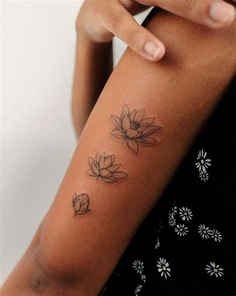 Forearm Lotus Flower Tattoo